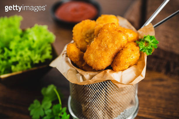 Chicken Breaded Raw Meat.Semifinished Breaded chicken nuggets from ...