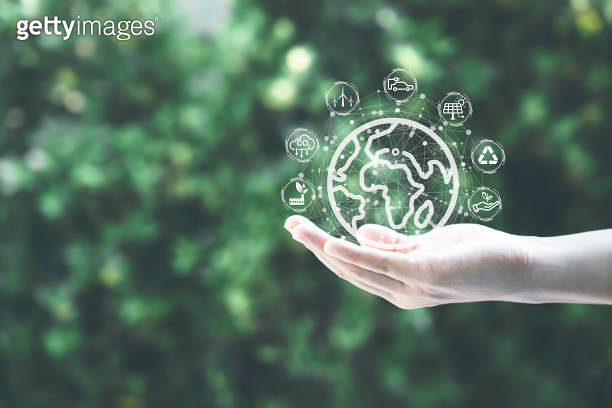 Hand holding drawing world with CO2 reducing ,Recycle ,green factory icon on nature for decrease ...