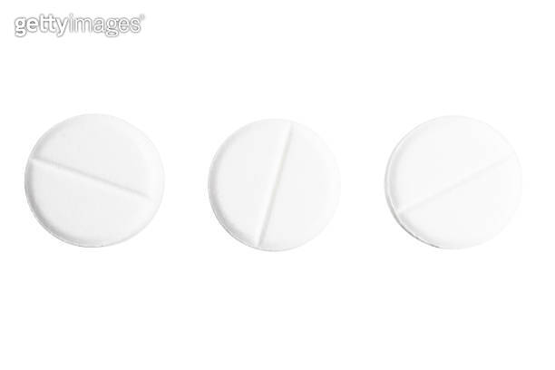 White round pills, group of drugs and tablets for treatment, isolated ...