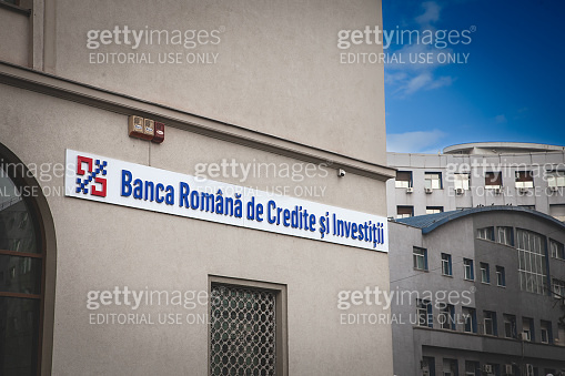 Banca Romana De Credite Si Investitii Bank logo in front of a local ...