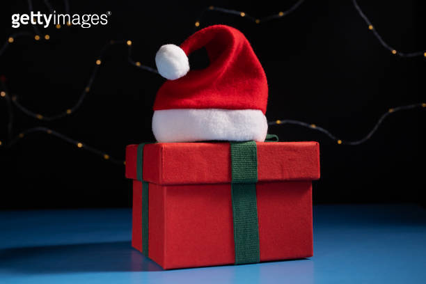 Christmas box, Santa hat ribbon, family gift, joyful wrapping ...
