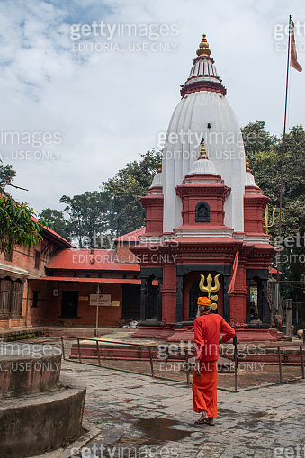 Kathmandu, Nepal: a hindu guru outside one of the 518 mini temples ...