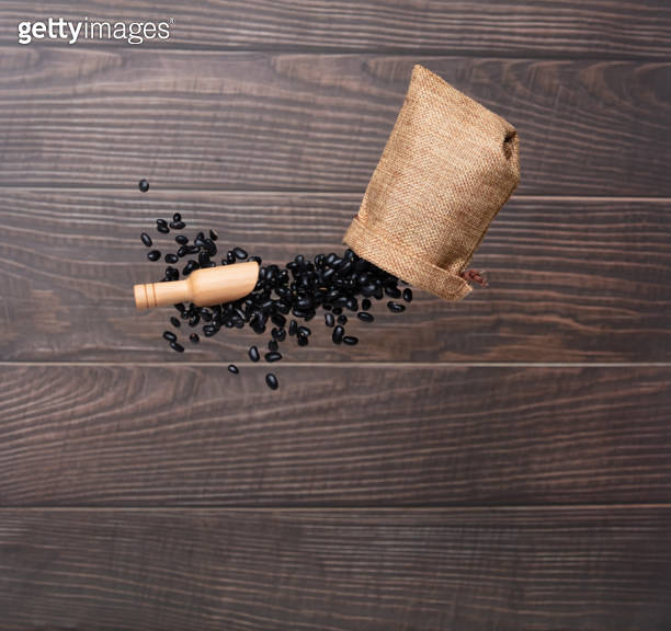Black Bean flying explosion in sack bag, black grain beans explode ...