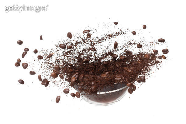 Coffee powder mix bean fall down pour in glass bowl, Coffee crushed mix ...