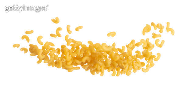 Macaroni flying explosion, yellow macaronis pasta float explode ...