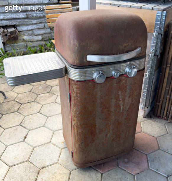 Old rusty dirty refrigerator from the 50's with tablet, vintage look ...