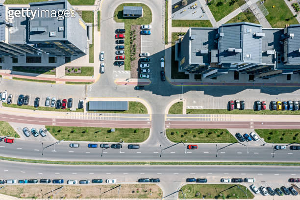 top view of urban streets, road intersections, parking lots and ...