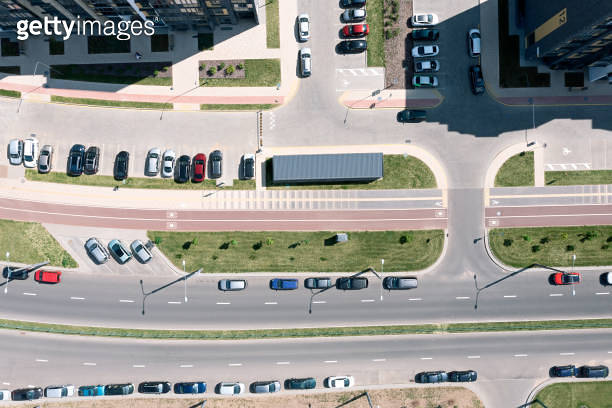 top view of urban streets, road intersections, parking lots and ...