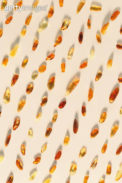 Natural Amber texture background, yellow orange color stones with glare ...