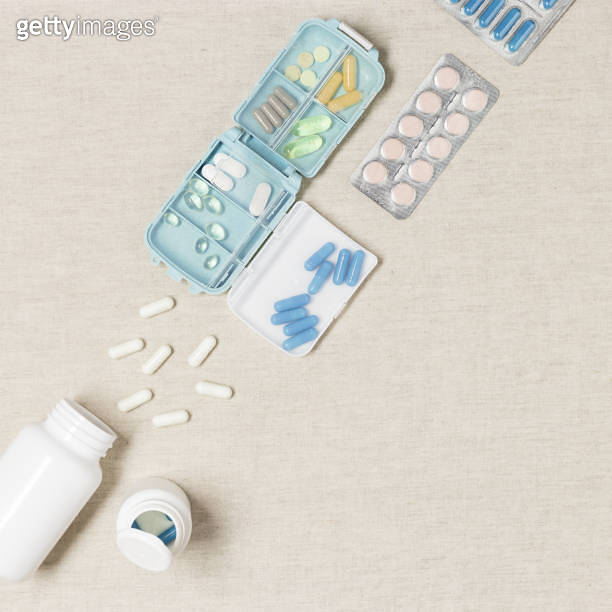 Top view medical bottle, tablets, capsules, nutrition supplements on ...