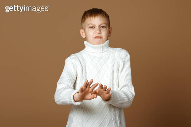 Displeased teen boy deny something, shakes hands and say no, rejects ...