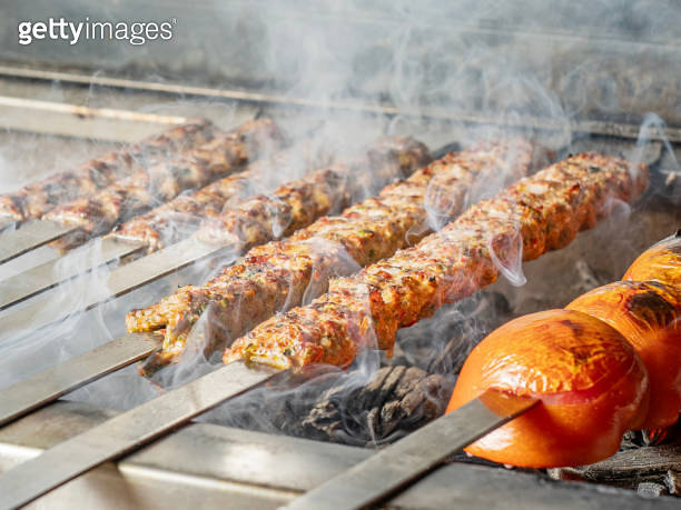 Traditional Turkish grilled shish kebab. Kebab on charcoal barbeque ...