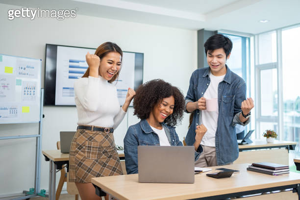 Group of young Asian businessmen are happy work together as a team and ...