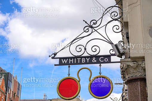 Traditional old shop sign for Whitby and Co on Fleet Street (1462200889 ...