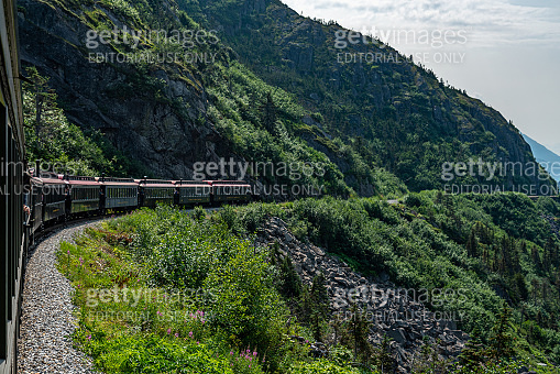 White Pass Summit excursion tour train in the mountains, Alaska, USA ...