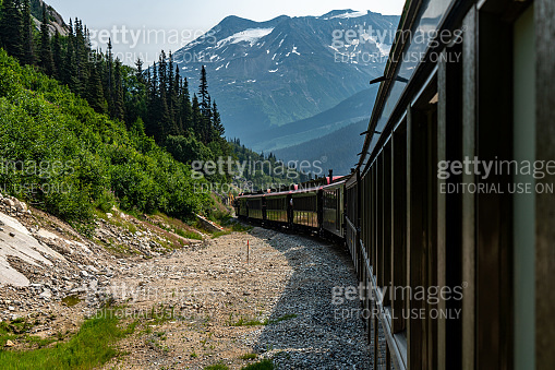 White Pass Summit excursion tour train in the mountains, Alaska, USA ...