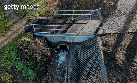 stream that cobbled into a narrow channel. the upper side is made of ...