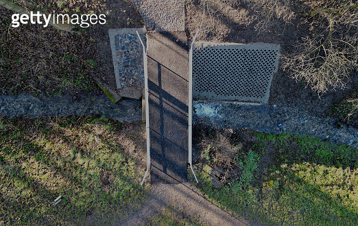 stream that cobbled into a narrow channel. the upper side is made of ...