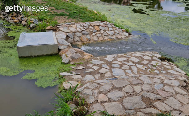 pond sluice, water reservoirs with regulation and concrete dam shaft ...