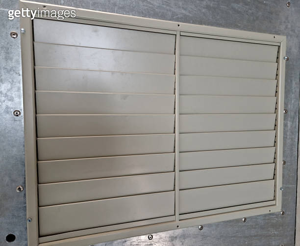 The high-quality metal ventilation grill in gray design without flange ...