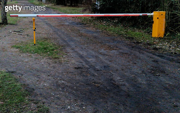 traffic barrier to yard with LED light strip. Striped aluminum barriers ...