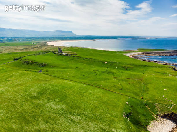 Spectacular aerial view of Mullaghmore Head with huge waves rolling ...