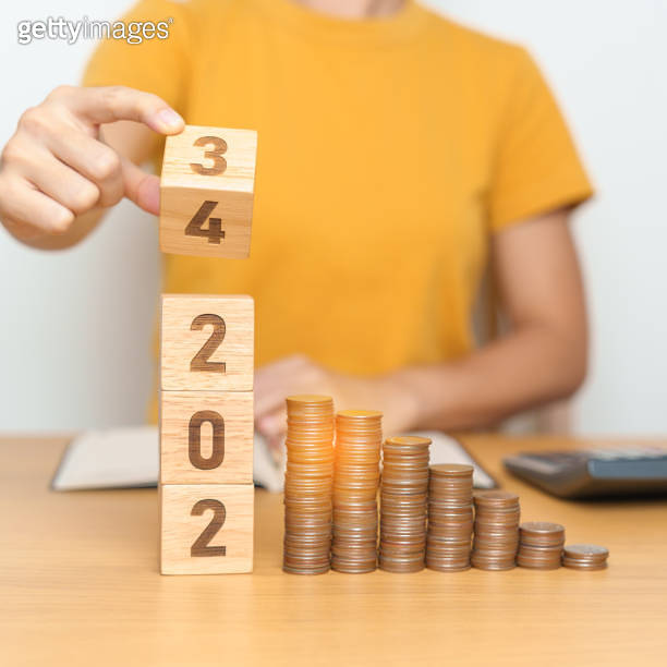 flipping 2023 to 2024 year block with Coins stack. Money, Budget, tax ...