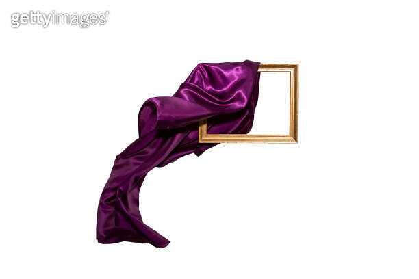 Flying purple satin cloth unveiling a golden frame. Levitating frame ...