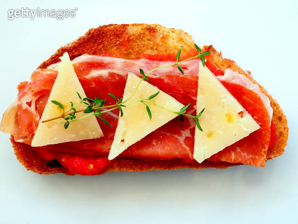 Delicious sandwich with sheep cheese, jamon and tomatoes 이미지 ...