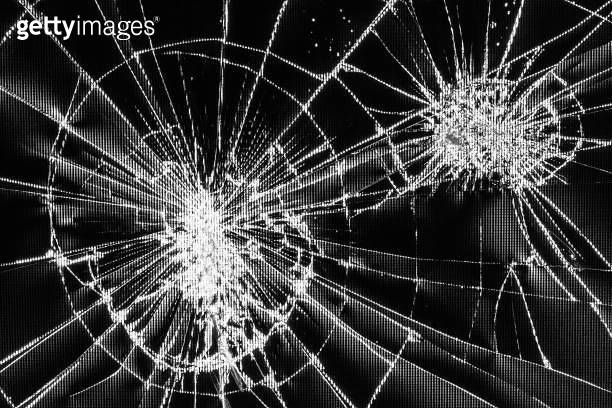 traces of bumps and cracks on a broken LCD screen, computer monitor or ...