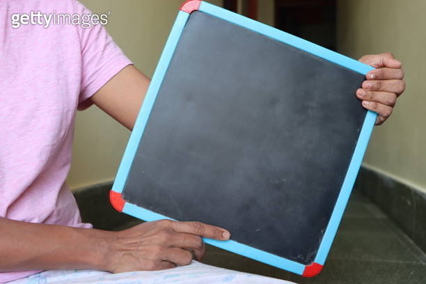 Female holding blank slate - concept of development, education 이미지 ...