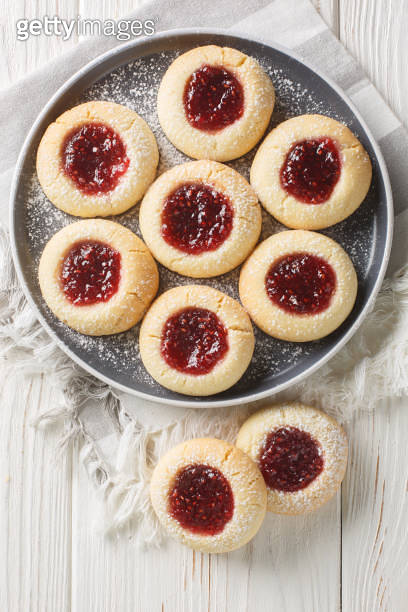Classic thumbprint cookies are made with a simple sugar cookie dough ...