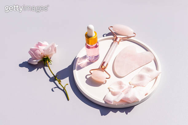 Rose Oil Cosmetic Bottle, Gua Sha Scraper, Quartz Roller Massager on ...
