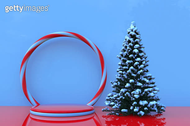 3D winter scene with round podium, candy arch and snow covered ...