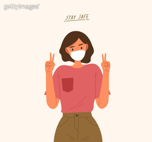 Young girl wearing mask and making v sign hand to encourage fighting ...