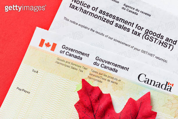 Government of Canada Tax Assessment Form and Refund Check with Maple ...