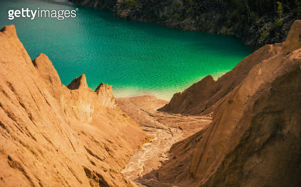 The shores of the mountain lake, the blue water in the lake. Turquoise ...