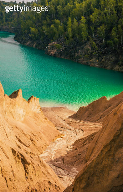 The shores of the mountain lake, the blue water in the lake. Turquoise ...