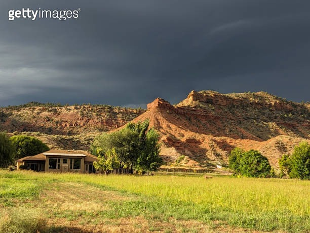 Monsoon thunderstorm building over the Virgin River Valley along ...