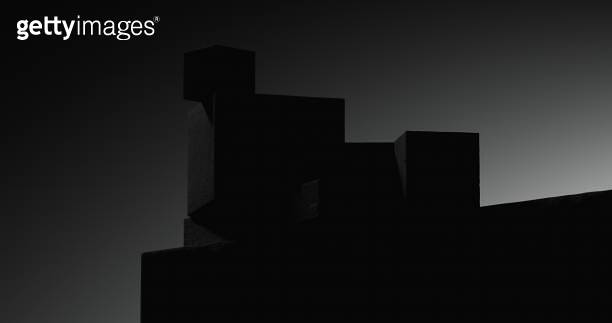 The shadowy outline of an abstract block structure in the absence of ...