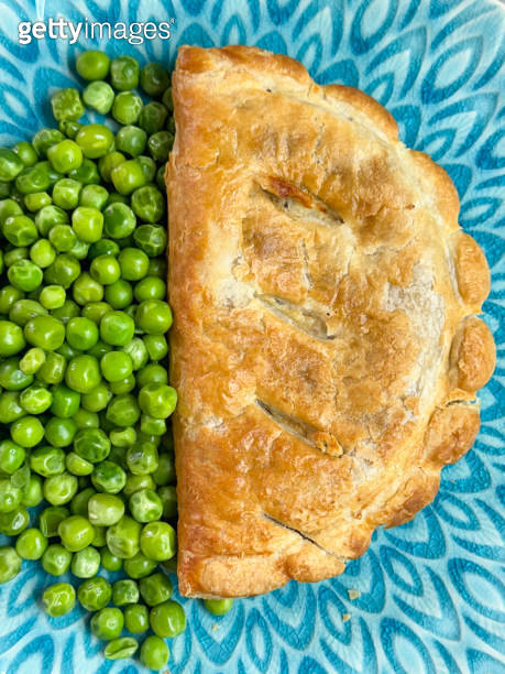 Full frame image of patterned blue plate containing homemade, Cornish ...