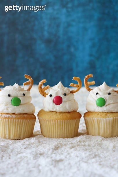 Close-up image row of three, homemade, Christmas reindeer design ...