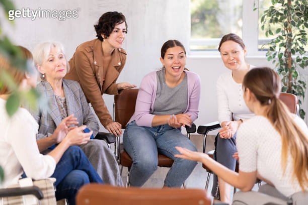 Friendly group of women discussing sitting on chairs in circle 이미지 ...