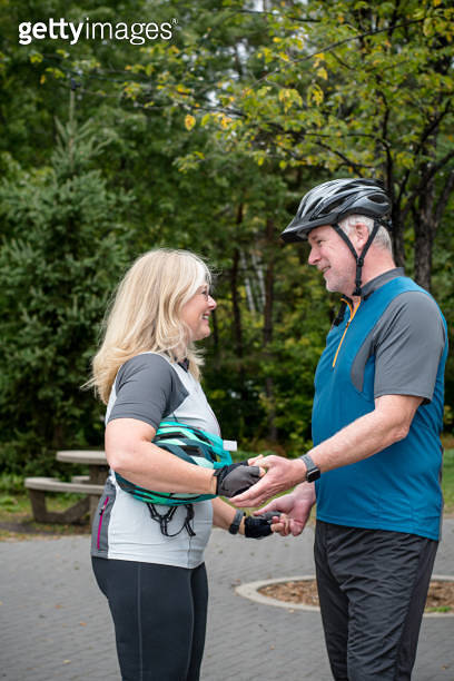 Rekindling Love Affectionate Mature Couple Connects After A Bike Ride 이미지 1693823524 게티이미지뱅크