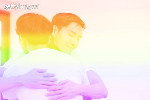 Happy Asian Gay Couple Hug Together On Sofa Asian Lgbt Couple