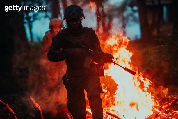 Soldier in Action at Night in the Forest Area. Night Time Military ...
