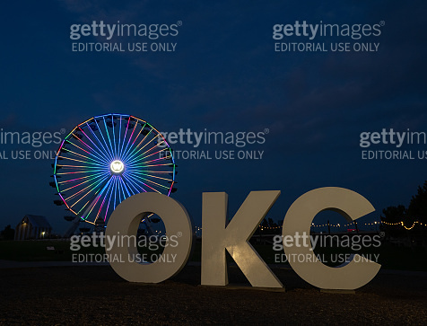 Iconic OKC Sign with the Colorful Wheeler Ferris Wheel Photographed at ...