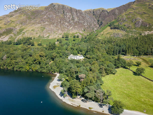 Aerial view of a beautiful lake and rural valley at Buttermere in the ...