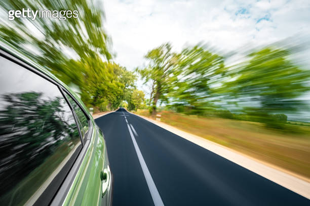 A car is driving on the highway, the environment is blurred 이미지 ...