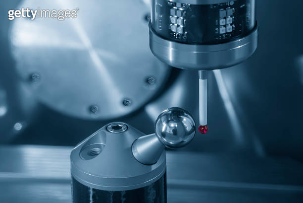 Close up scene the touching probe calibration process with sphere ball ...